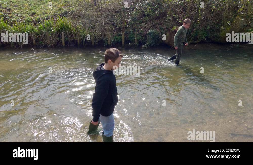 Two boys playing in river Stock Videos & Footage - HD and 4K Video ...
