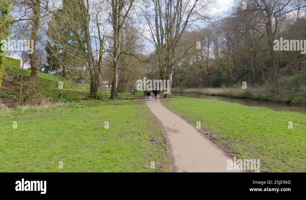People walking along on a country walk through a woodland pathway Stock ...