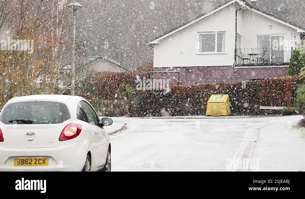 Snow falling on Fisherbeck Park in Ambleside, Lake District, UK Stock ...