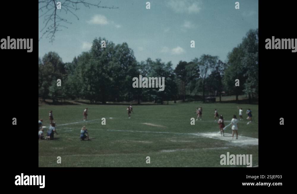 1940s: Teams switch places on softball field Stock Video Footage - Alamy