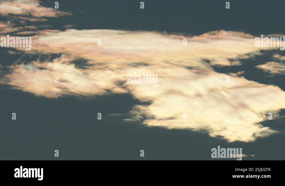 Colours in high altitude clouds caused by sunlight refrating off ice ...