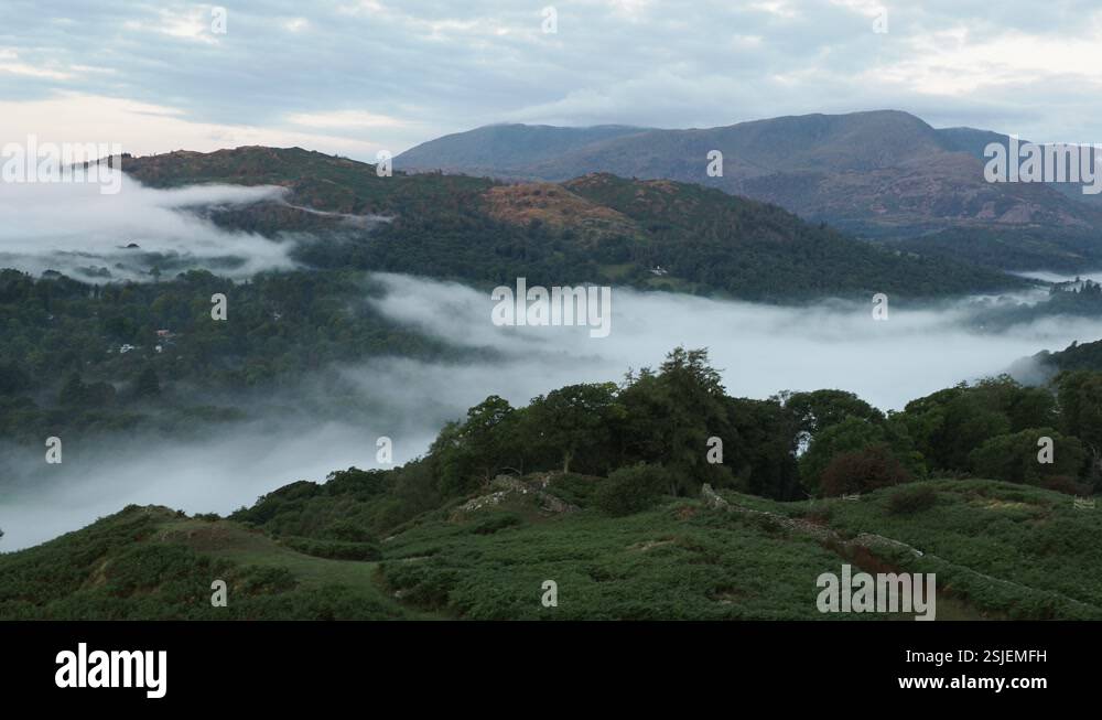 Dawn mist in the Langdale Valley, looking towards Coniston Old Man ...