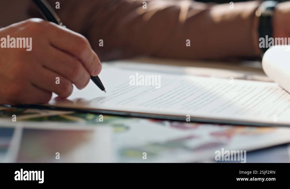 Man hand signing contract sitting office desk close up. Boss putting ...