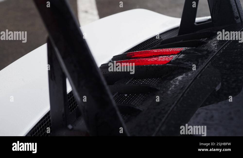 Modern super race car detail, rear engine, spoiler in 4K Stock Video ...