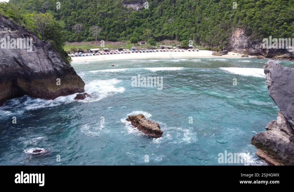 Establishing aerial location reveal of Atuh Beach cove, Nusa Penida ...