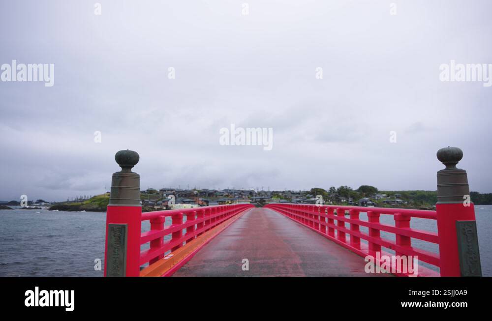 Tilt Reveal of Long Red Bridge to Oshima Island in Fukui Prefecture ...