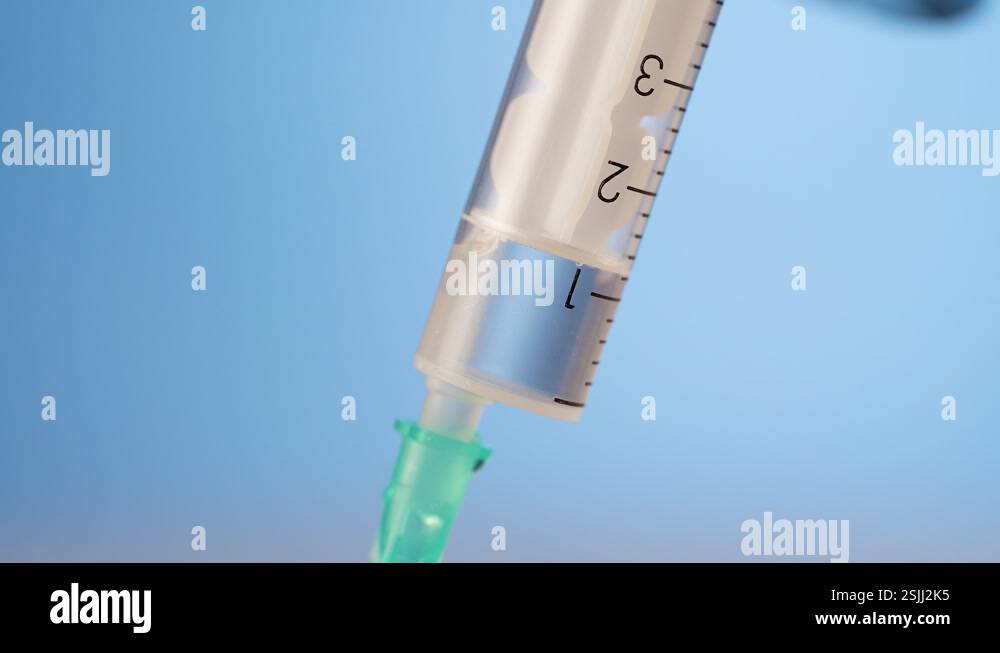 Injecting liquid medication through medical Stock Videos & Footage - HD ...