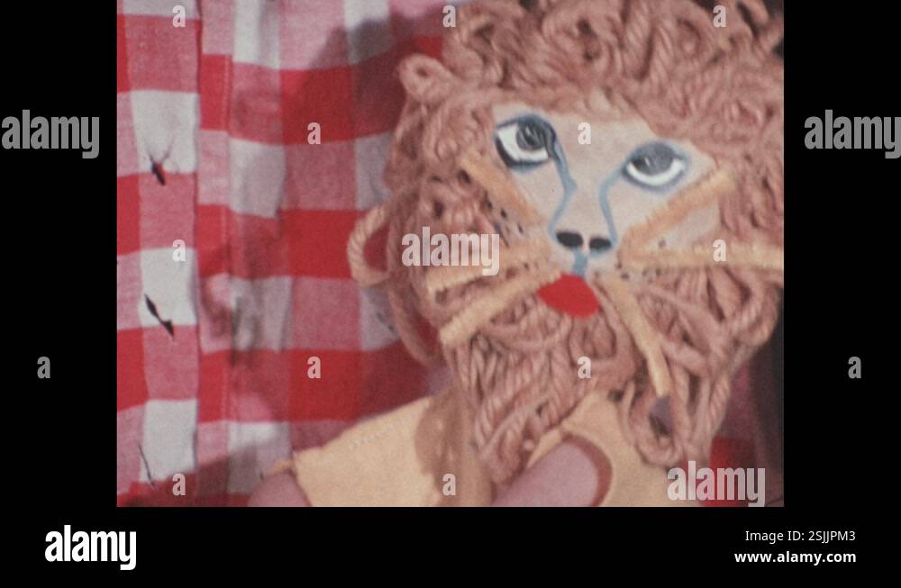 1970s: Puppet lion looks around puppet theater, interacts with puppet ...