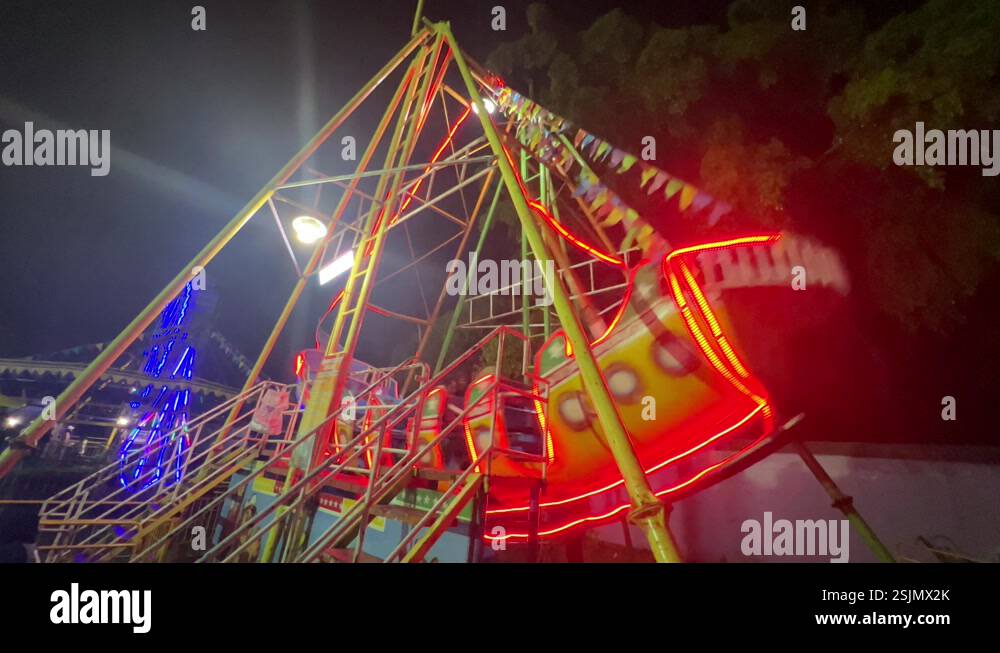 Pirate Ship Pendulum Ride Amusement Park in Night Fun Fair Stock Video ...