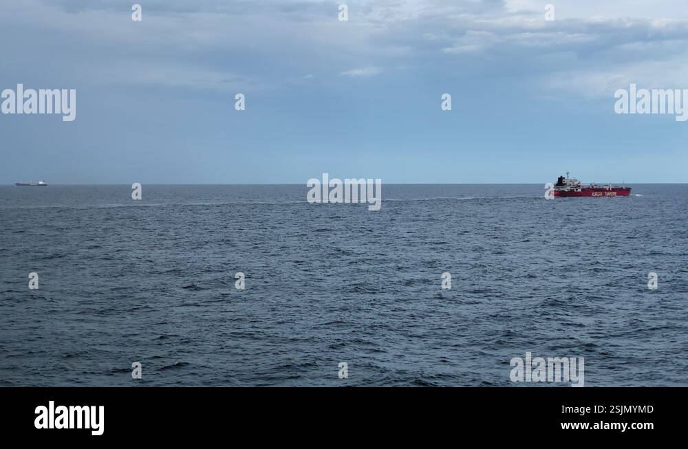 An oil tanker sailing in the Gulf of Mexico in slow motion with another ...