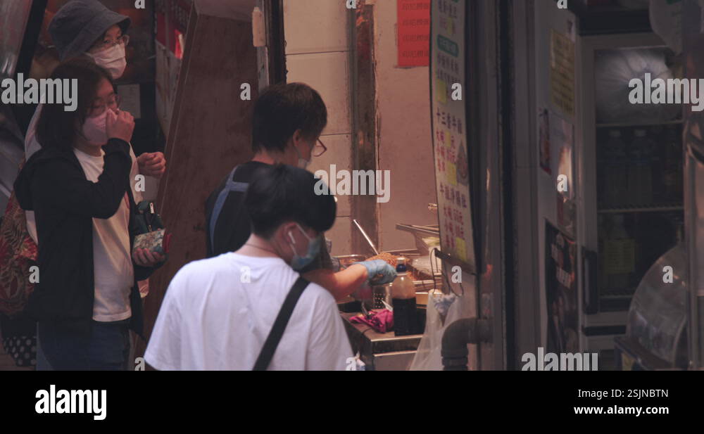 People Queue At Street Cafes In Hong Kong Stock Video Footage - Alamy