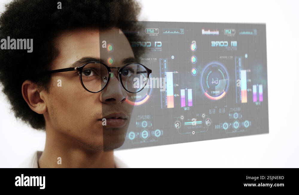 Engineer using glasses with holographic projection of engine status on ...