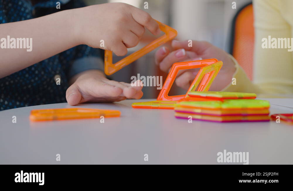 Details on the hands of a child boy with disability - Down syndrome ...