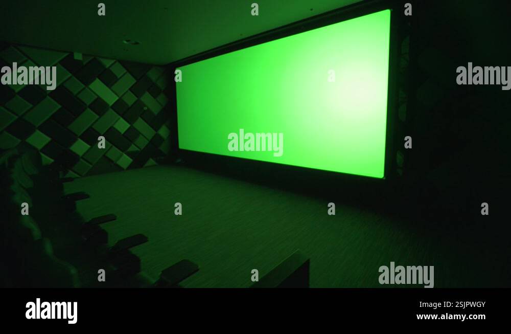 Modern cinema, view of the big green screen in the cinema room ...