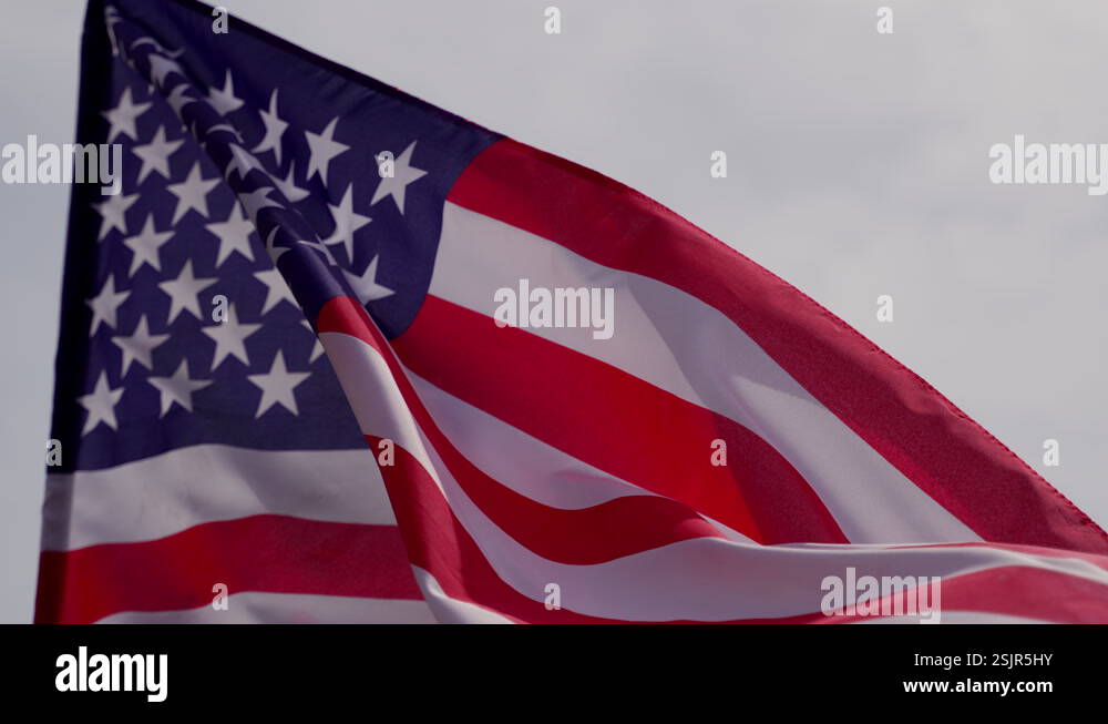 National flag of the United States of America blowing in the wind ...