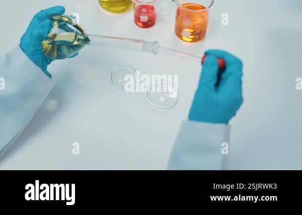 Scientific laboratory researcher drop liquid sample on microscopic ...