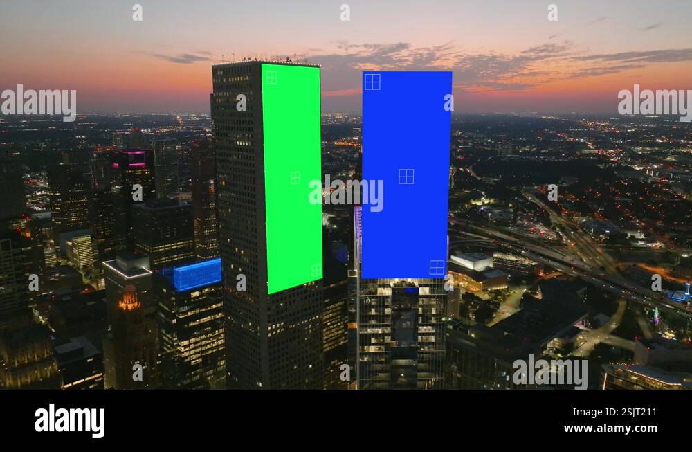 Green and blue screen on side of a skyscrapers in downtown Houston, USA ...