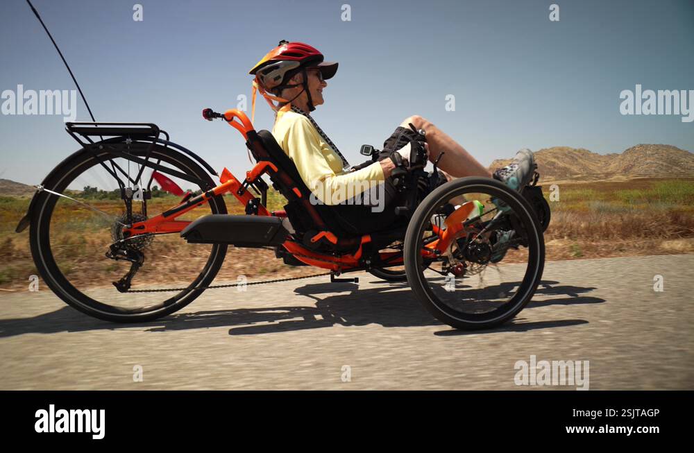 Woman tricycle Stock Videos & Footage - HD and 4K Video Clips - Alamy
