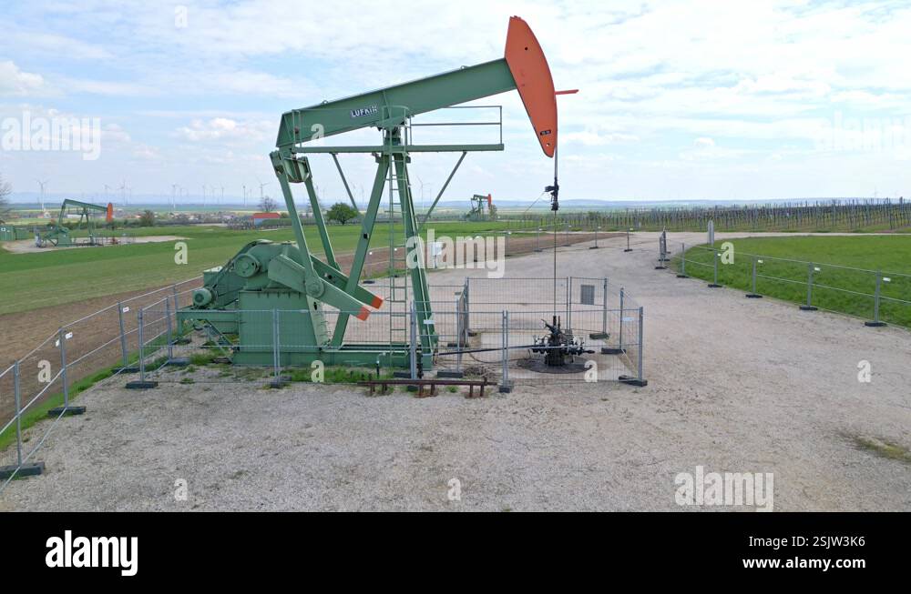 Pumpjack Mining Crude Oil In An Oil Well In Slow Motion. Rag Fields In ...