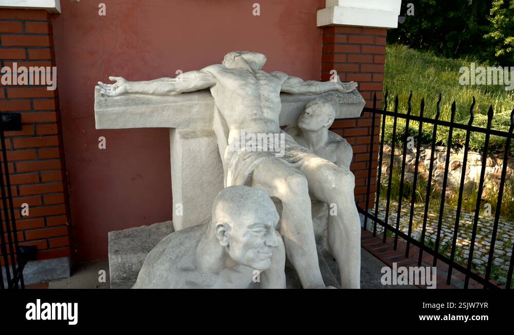Statue of Jesus falling on the cross, station of the Cross in ...