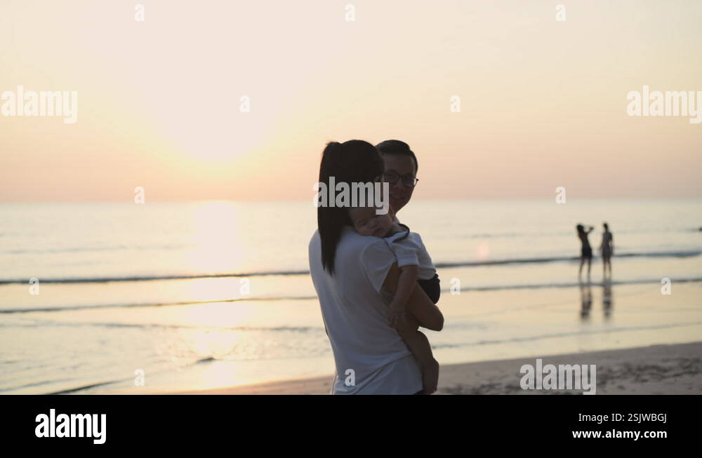 Tourism concepts of 4k Resolution. Asian family walking together by the beach Stock Video ...