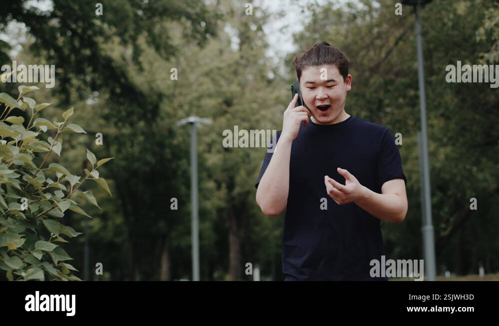 Young asian man stands Stock Videos & Footage - HD and 4K Video Clips ...