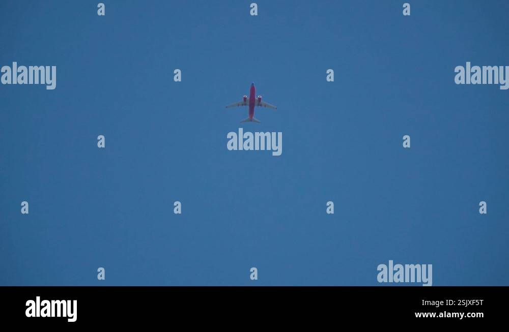 Airplane flight over skyscrapers business center. Bottom view of a ...