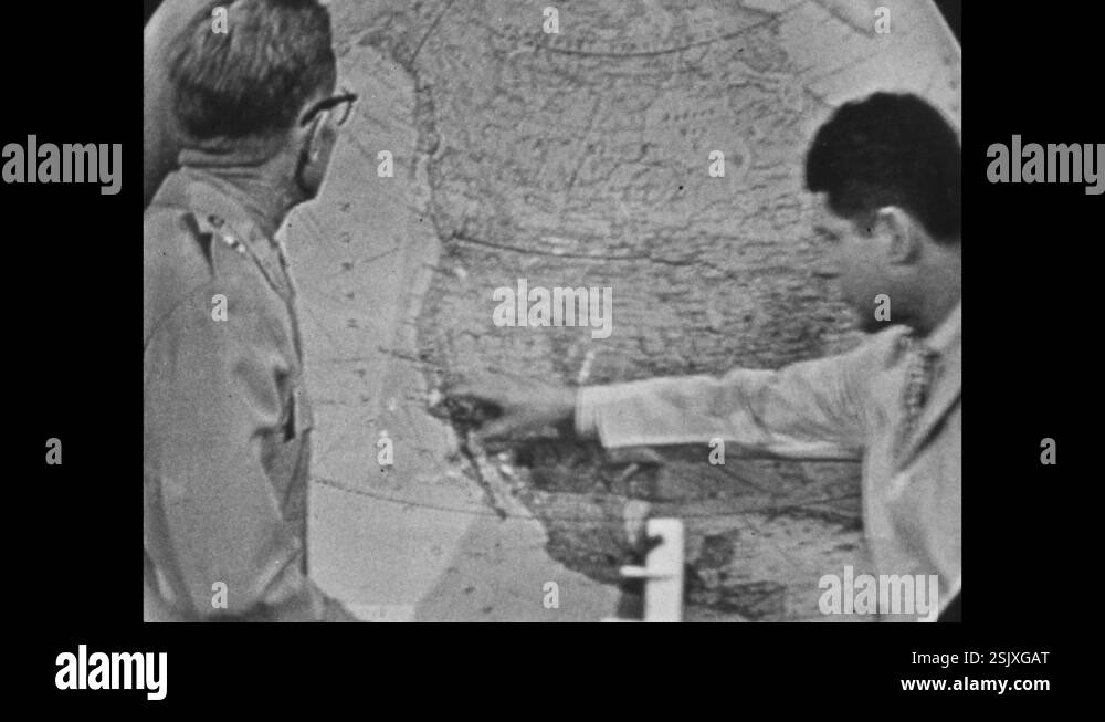 1940s: Map. Man points. Man circles area on map Stock Video Footage - Alamy