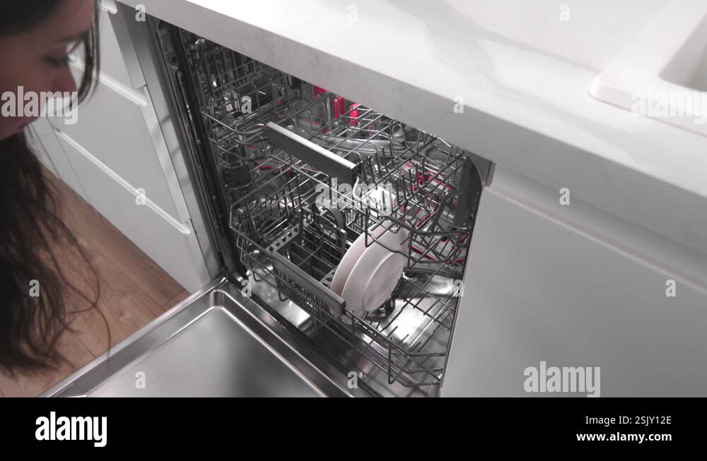 House Chores - Woman Open The Door Of The Dishwasher Then Pull Out The ...