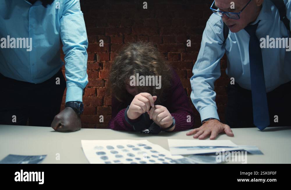 Aggressive police officers yelling at scared woman suspect during ...