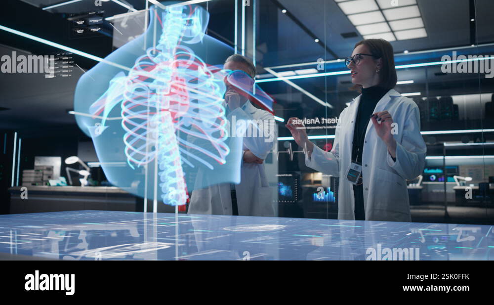 Two Scientists Using VFX Hologram Of Human Body In Lab Stock Video ...