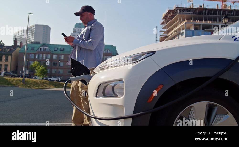 Electric Vehicle Charging Port Plugging in EV Modern Car Stock Video ...