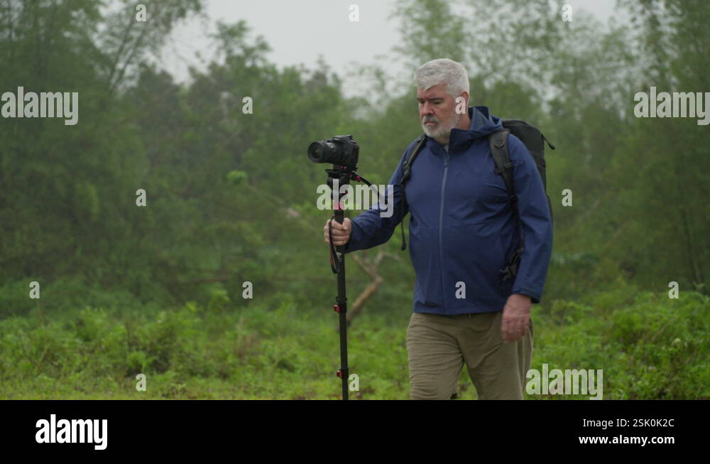 Aged man walking holding camera Stock Videos & Footage - HD and 4K ...