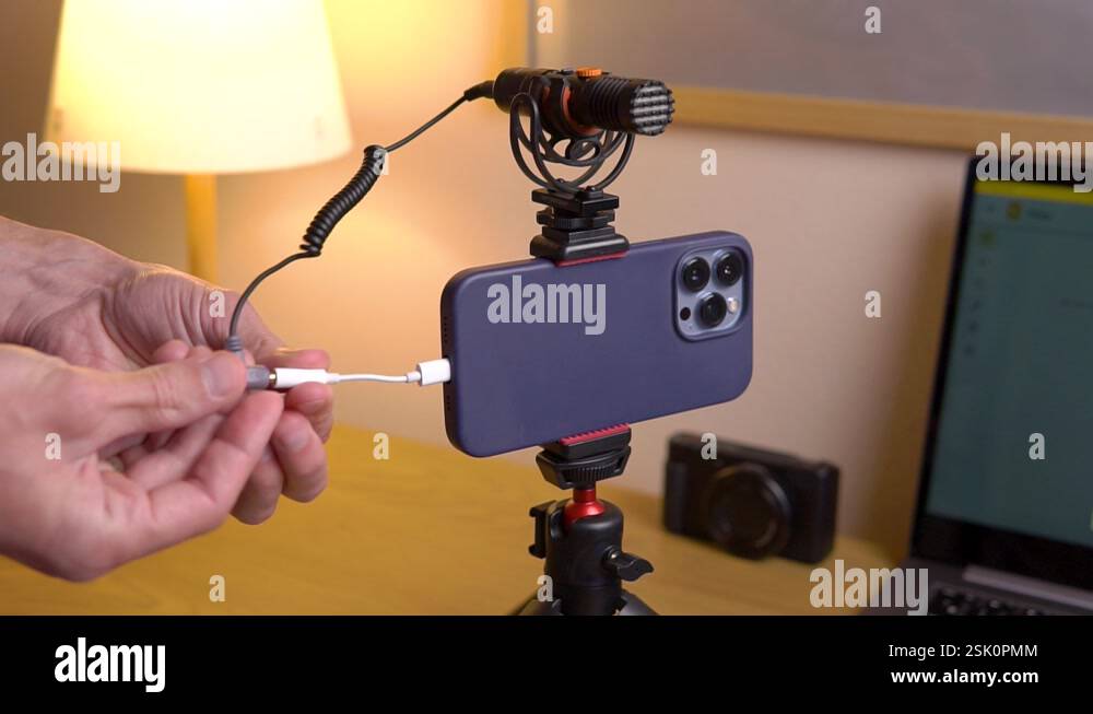 vlog setup with smarthone and microphone on tripod in vlogging studio ...