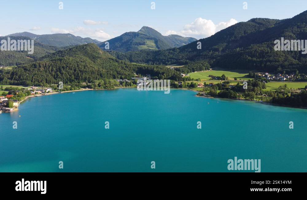 Wonderful 4k aerial of Austrian lake Fuschl am see surrounded by ...