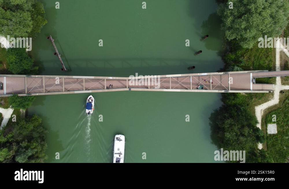 Boats crossing under bridge. Drone footage in 4k Stock Video Footage ...