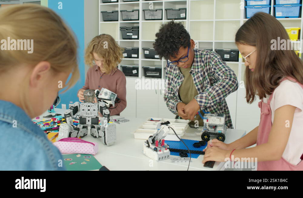 Multiethnic Children Building Robot Models at After School Science Club ...