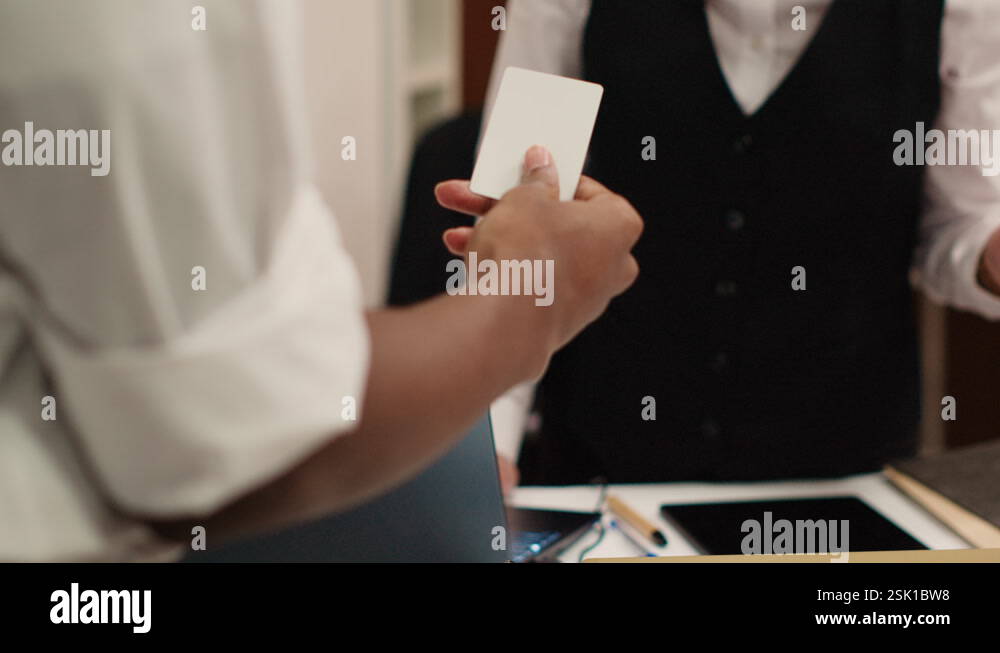 Handing key card Stock Videos & Footage - HD and 4K Video Clips - Alamy