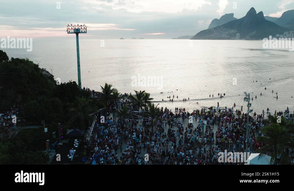A large crowd of people on the famous Ipanema beach in the evening, Rio ...