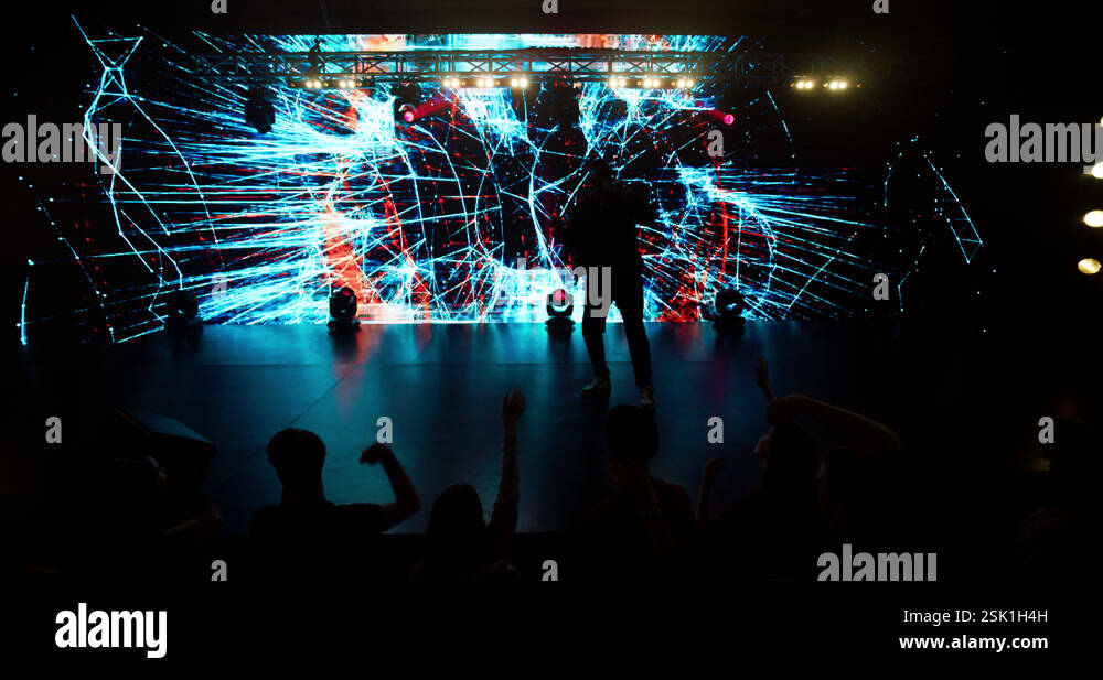 African-American Black rap artist performing his gig on a stage of a ...