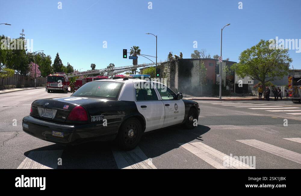 Police Car Blocking off street at scene Stock Video Footage - Alamy