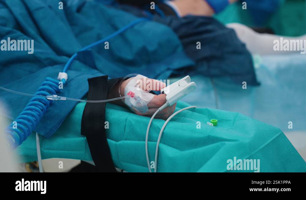 the patient is ready for surgery, anesthesia, pulse oximeter on finger ...