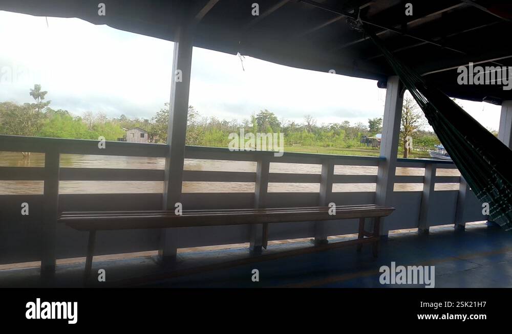 sailing the amazon river in amazonia rainforest Brazil with a boat and ...