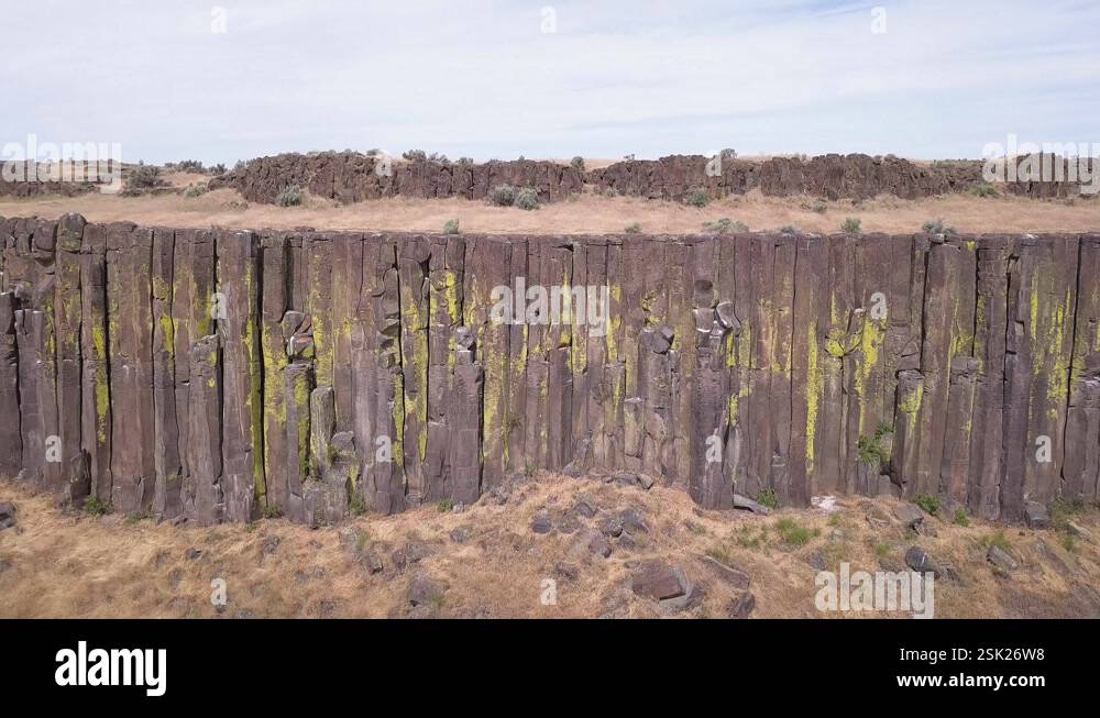 Tall orderly columns of volcanic basalt form channeled scablands cliff ...