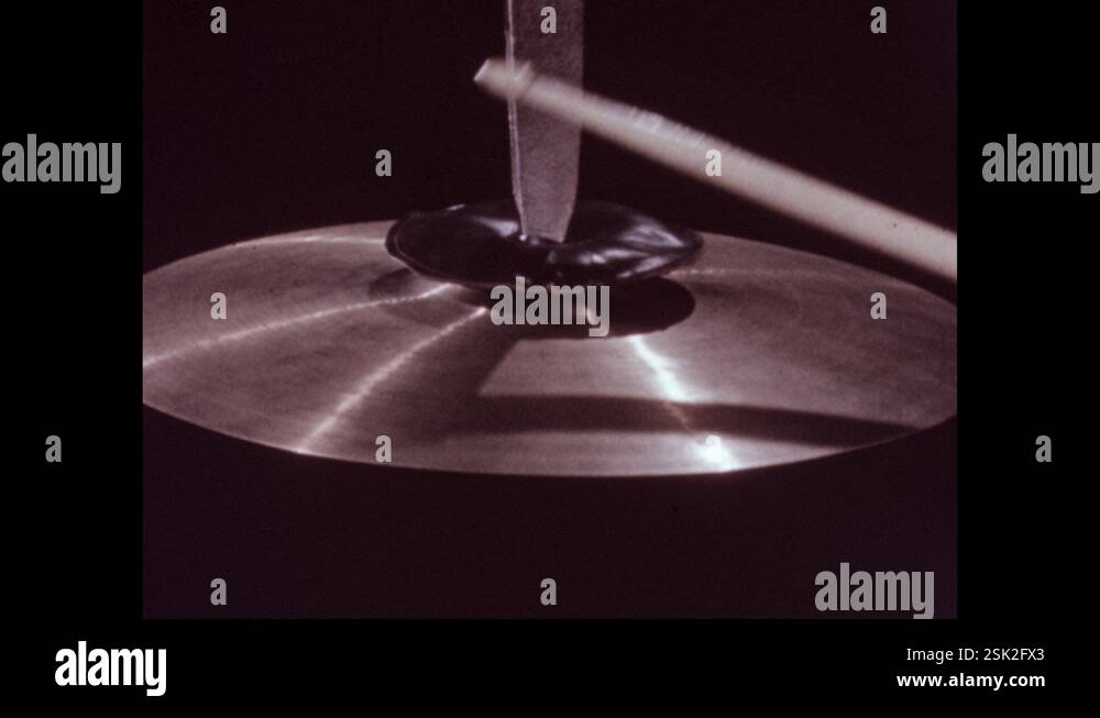 1950s: Cymbal, drum stick hits cymbal lightly. Stick hits cymbal hard ...