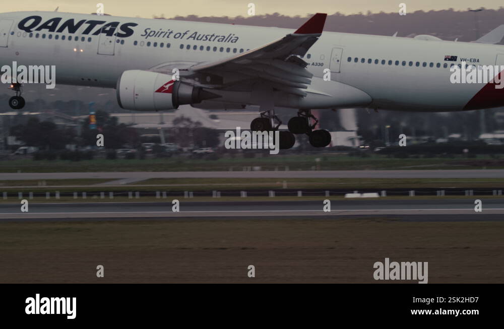 Side view of Airbus A330 of Qantas landing Stock Video Footage - Alamy