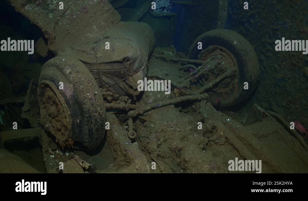 Overturned car and other cargo inside hold of ferry Salem Express ...