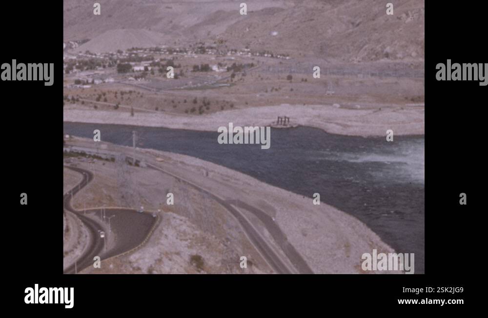 1960s: Road. Town. River. Dam Stock Video Footage - Alamy