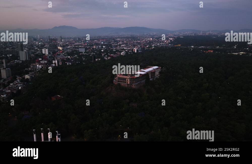 Aerial view around the Chapultepec castle, dusk in Mexico city - orbit ...
