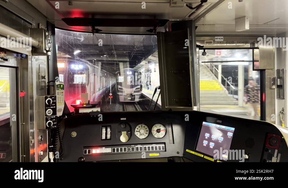 Subway train in Kyoto moving after leaving the station. View inside ...
